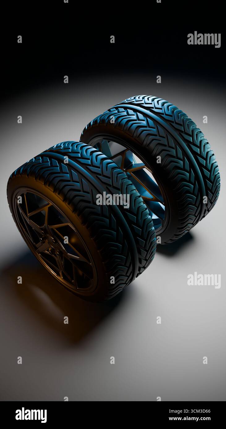 3D rendered image of two modern car tires with alloy rims arranged ...