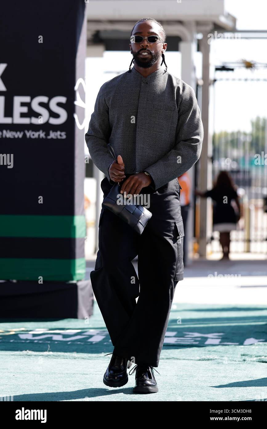 New York Jets quarterback Tyrod Taylor arrives before an NFL football ...