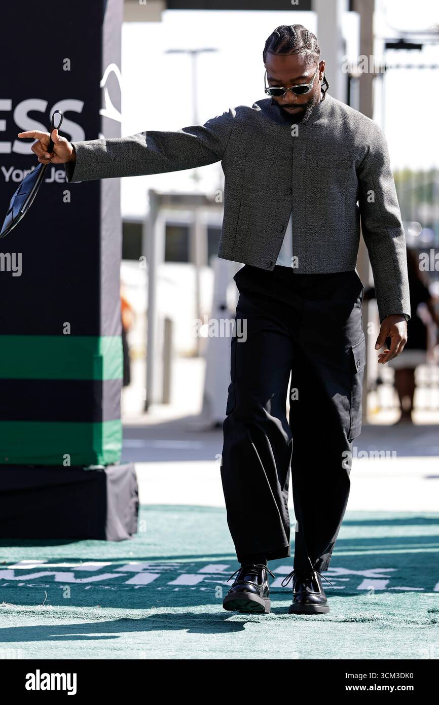 New York Jets quarterback Tyrod Taylor arrives before an NFL football ...