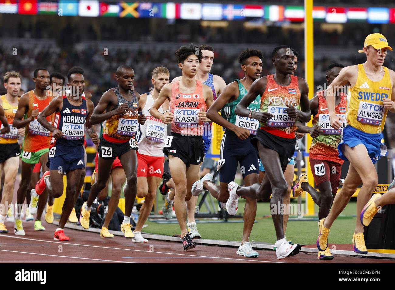 Athletes compete in the men's 10,000-meter event at the World Athletics ...