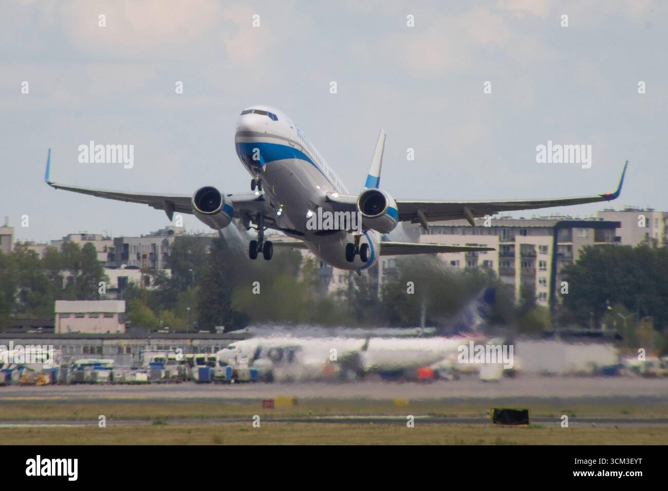 An Enter Air passenger jet is seen taking off from Chopin International ...