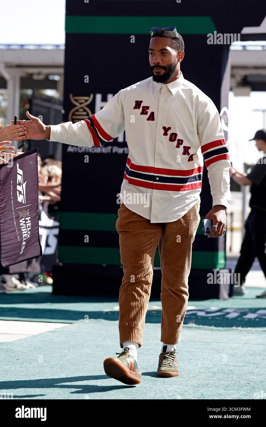 New York Jets safety Andre Cisco arrives before an NFL football game ...