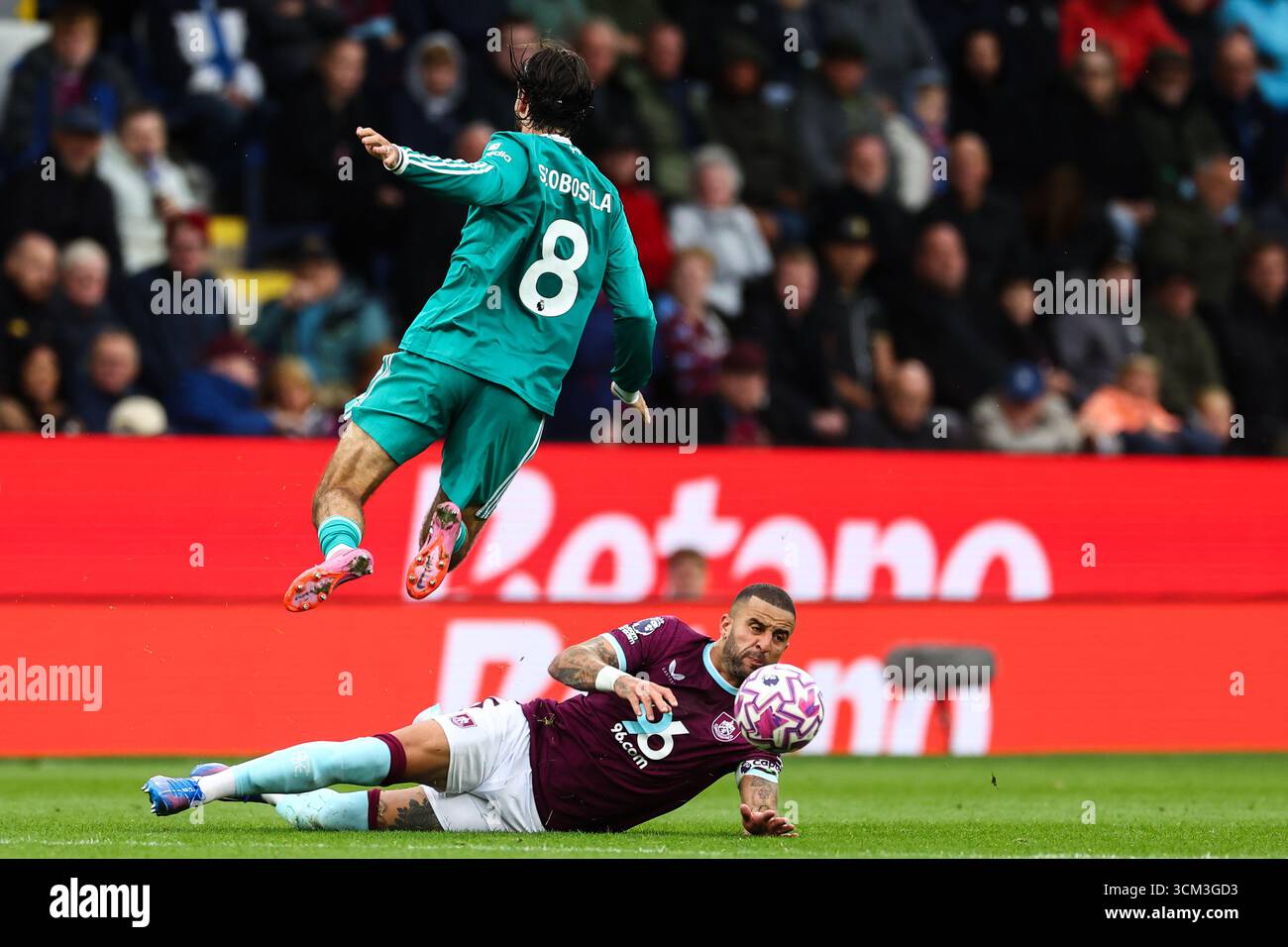 Burnley, England, 14th September 2025. Kyle Walker of Burnley tackles ...