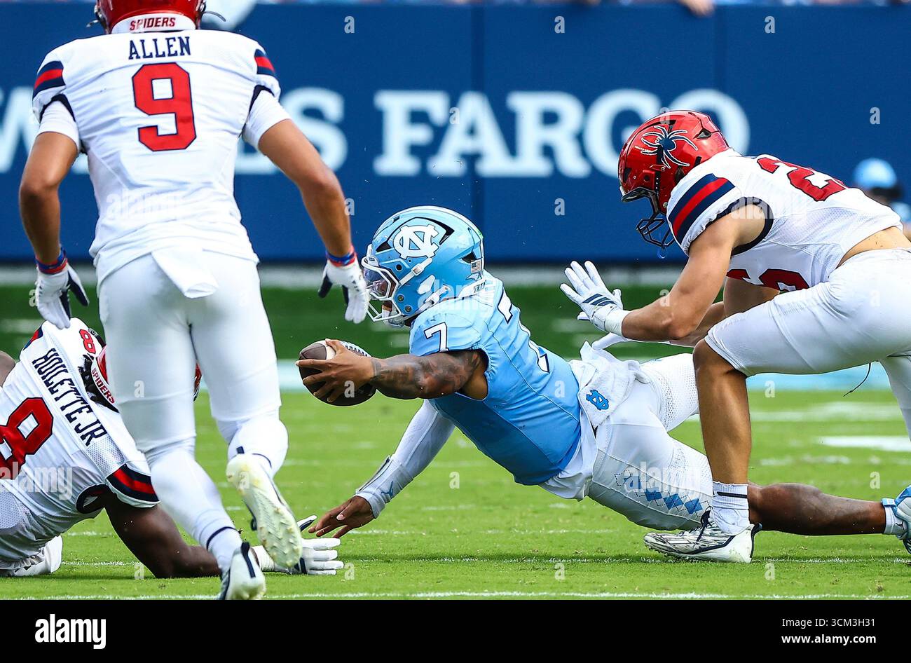 September 13, 2025: North Carolina quarterback Gio Lopez (7) stenches ...