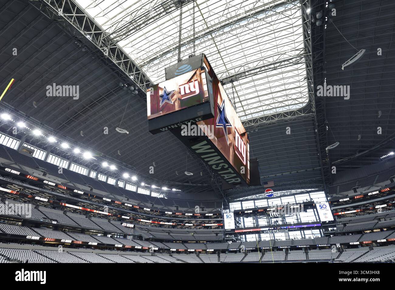 The videoboard at AT&T Stadium shows the matchup for a NFL football ...