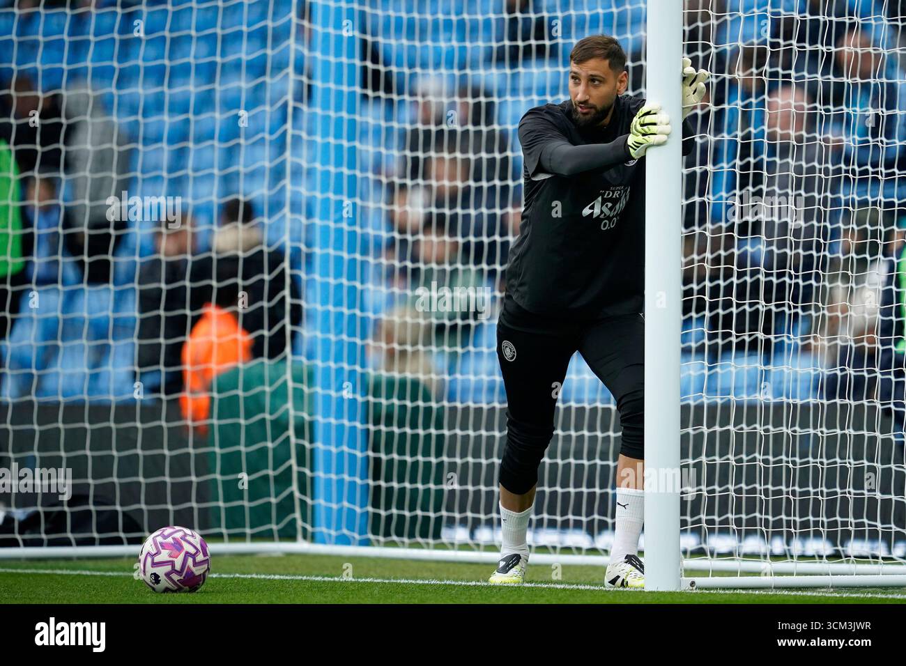 Manchester City's goalkeeper Gianluigi Donnarumma warms up for the ...