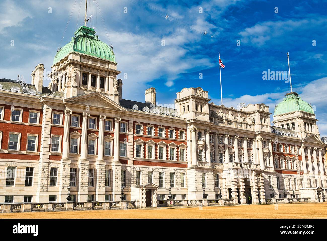 An imposing neoclassical building with red brick and white stone ...