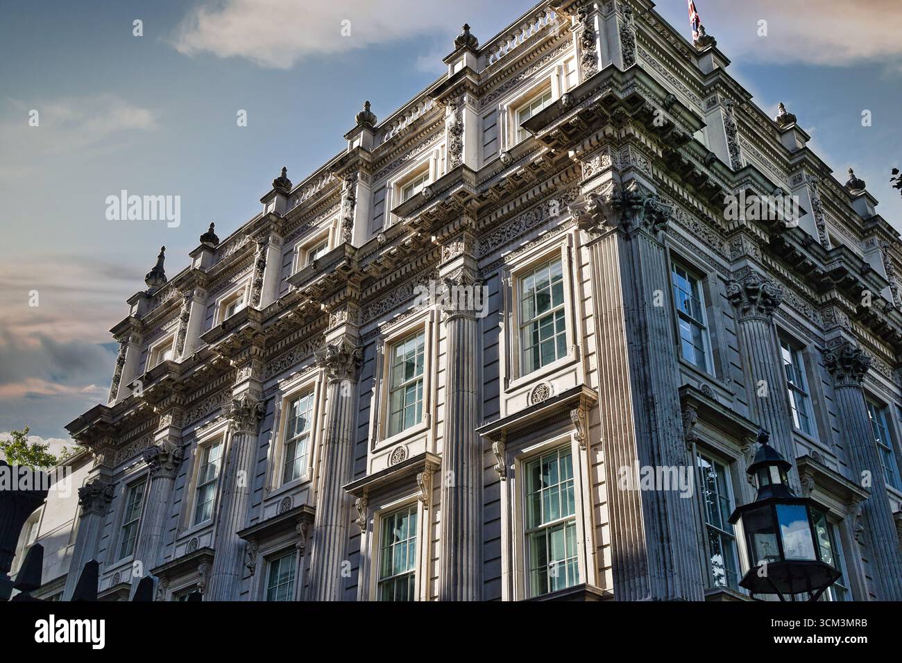 An ornate, multi-story stone building with detailed architectural ...