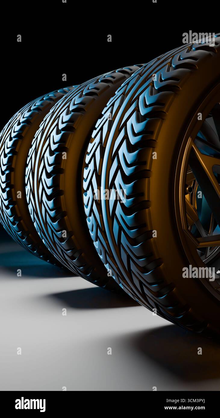 A row of shiny black tires with intricate tread designs mounted on ...
