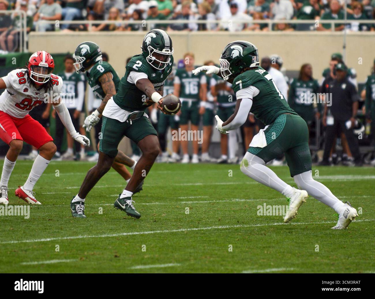 September 13, 2025: Michigan State quarterback Aidan Chiles (2) hands ...