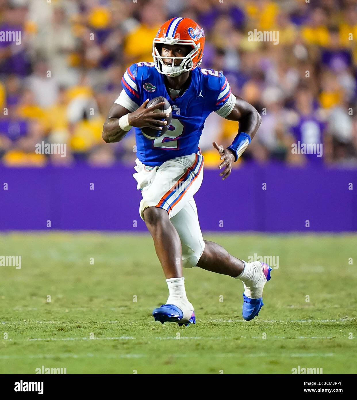Florida Gators quarterback DJ Lagway (2) scrambles for yards during the ...