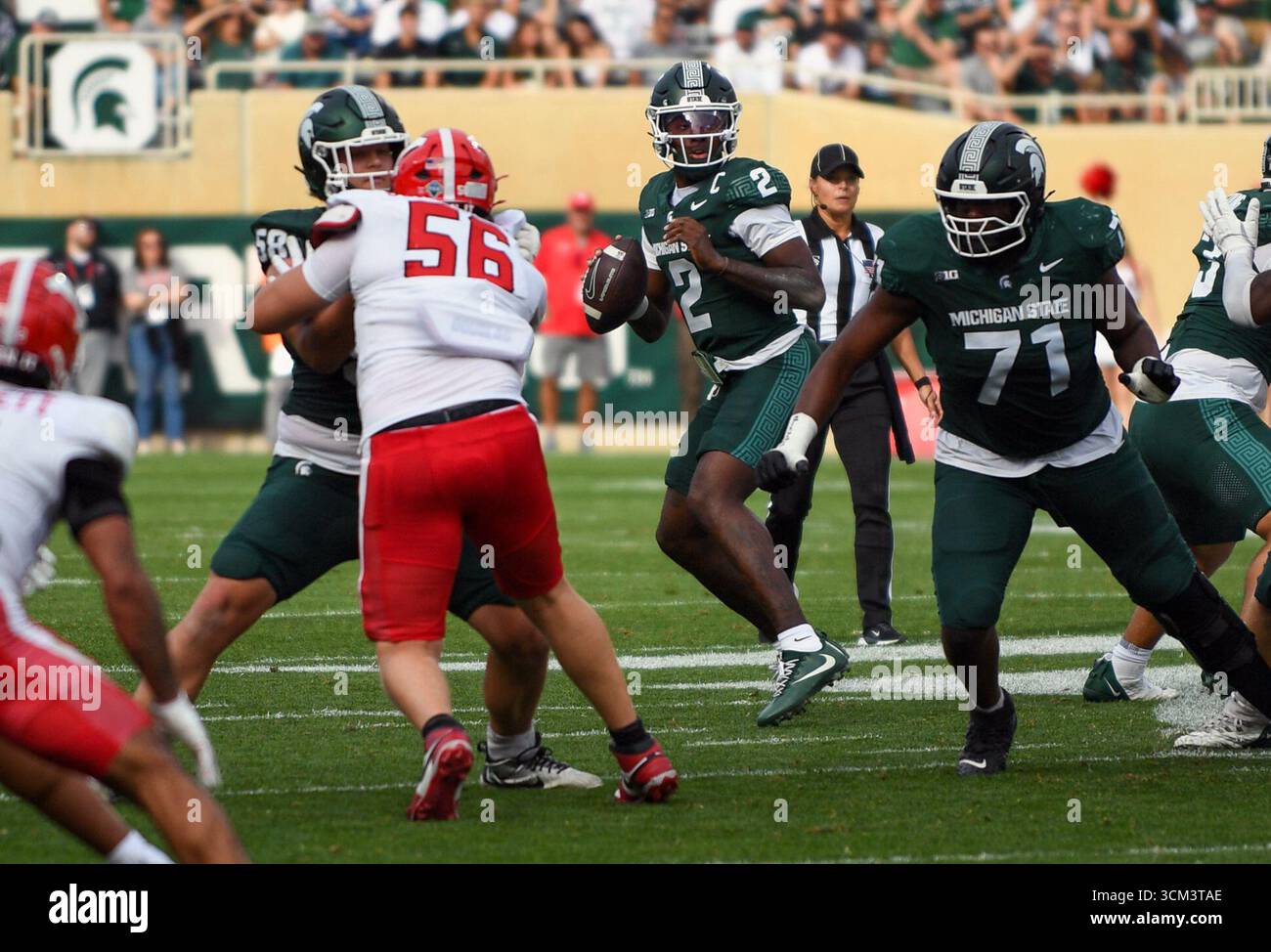 September 13, 2025: Michigan State quarterback Aidan Chiles (2) drops ...