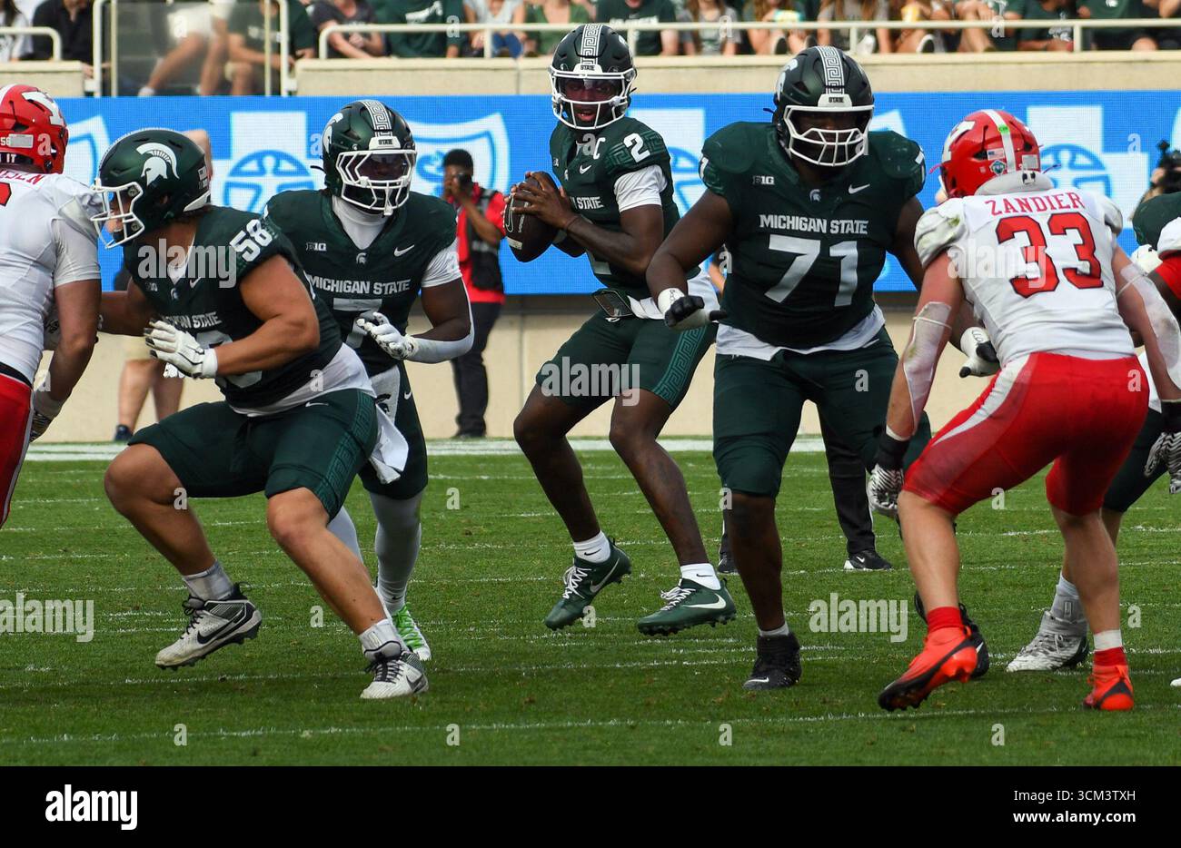 September 13, 2025: Michigan State quarterback Aidan Chiles (2) drops ...