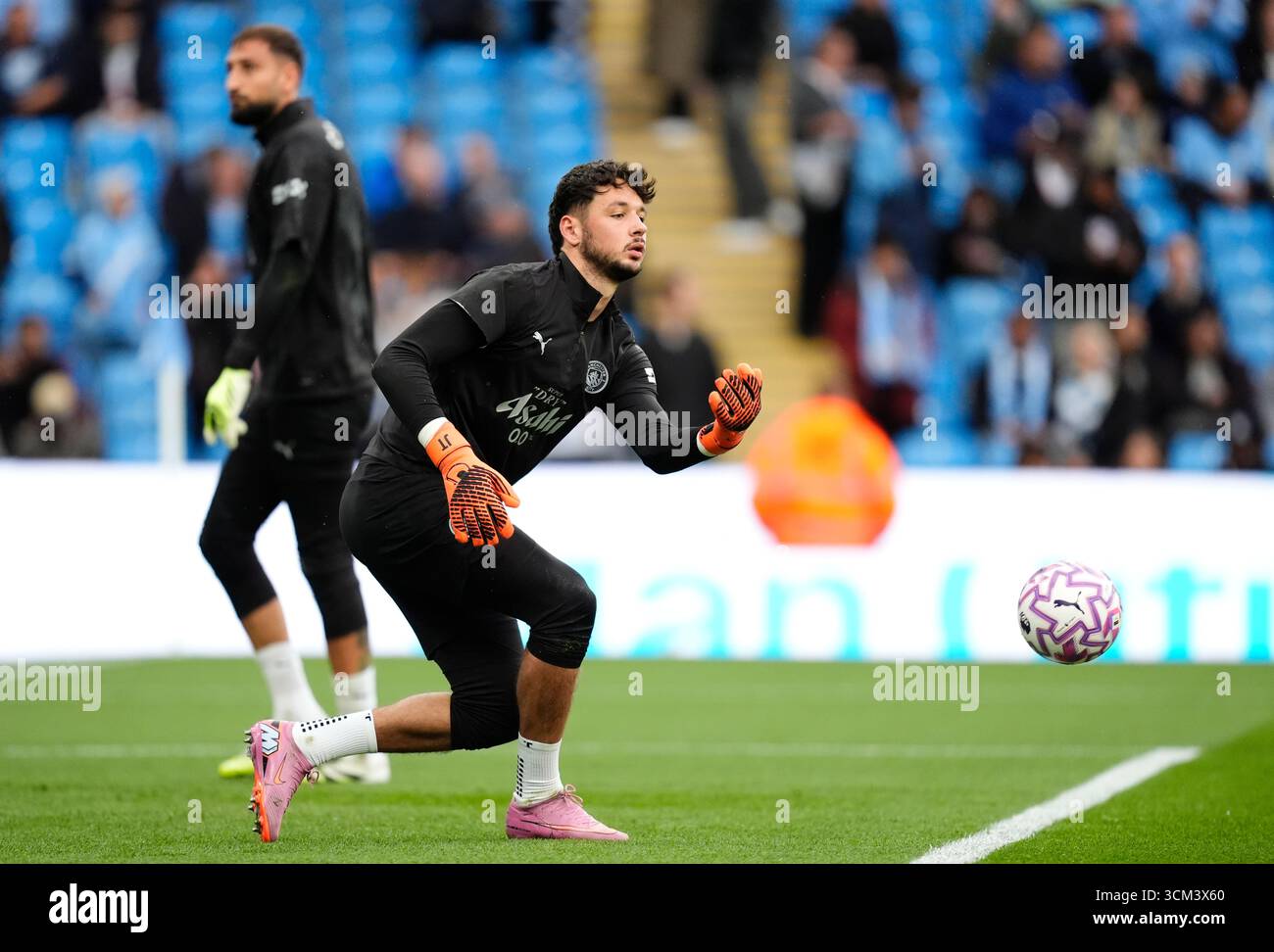 Manchester City goalkeeper James Trafford warming up ahead of the ...