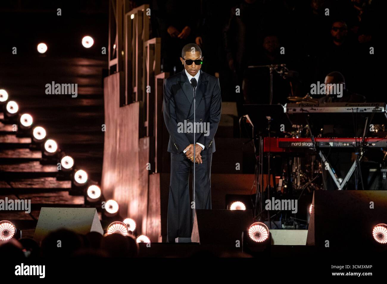 Pharrell Williams performs on the stage during the “Grace For The World ...