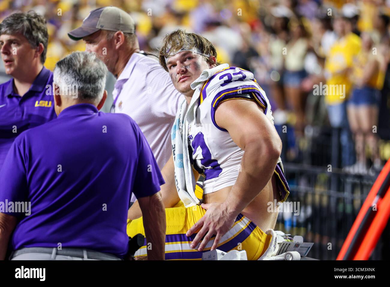 September 13, 2025: LSU linebacker West Weeks (33) sits on the injury ...