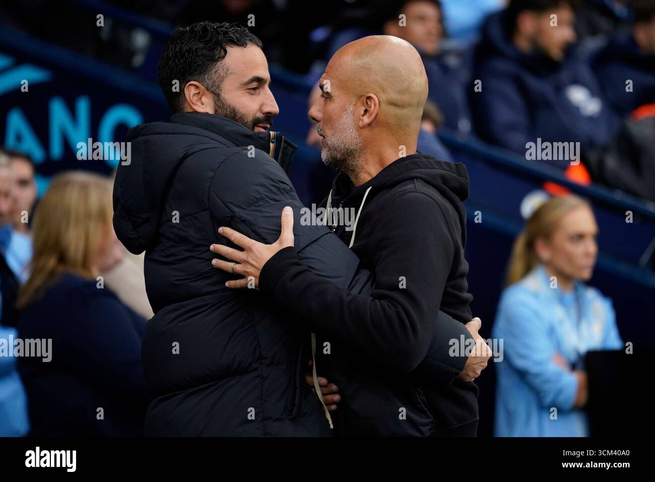Manchester United's head coach Ruben Amorim, left, and Manchester City ...