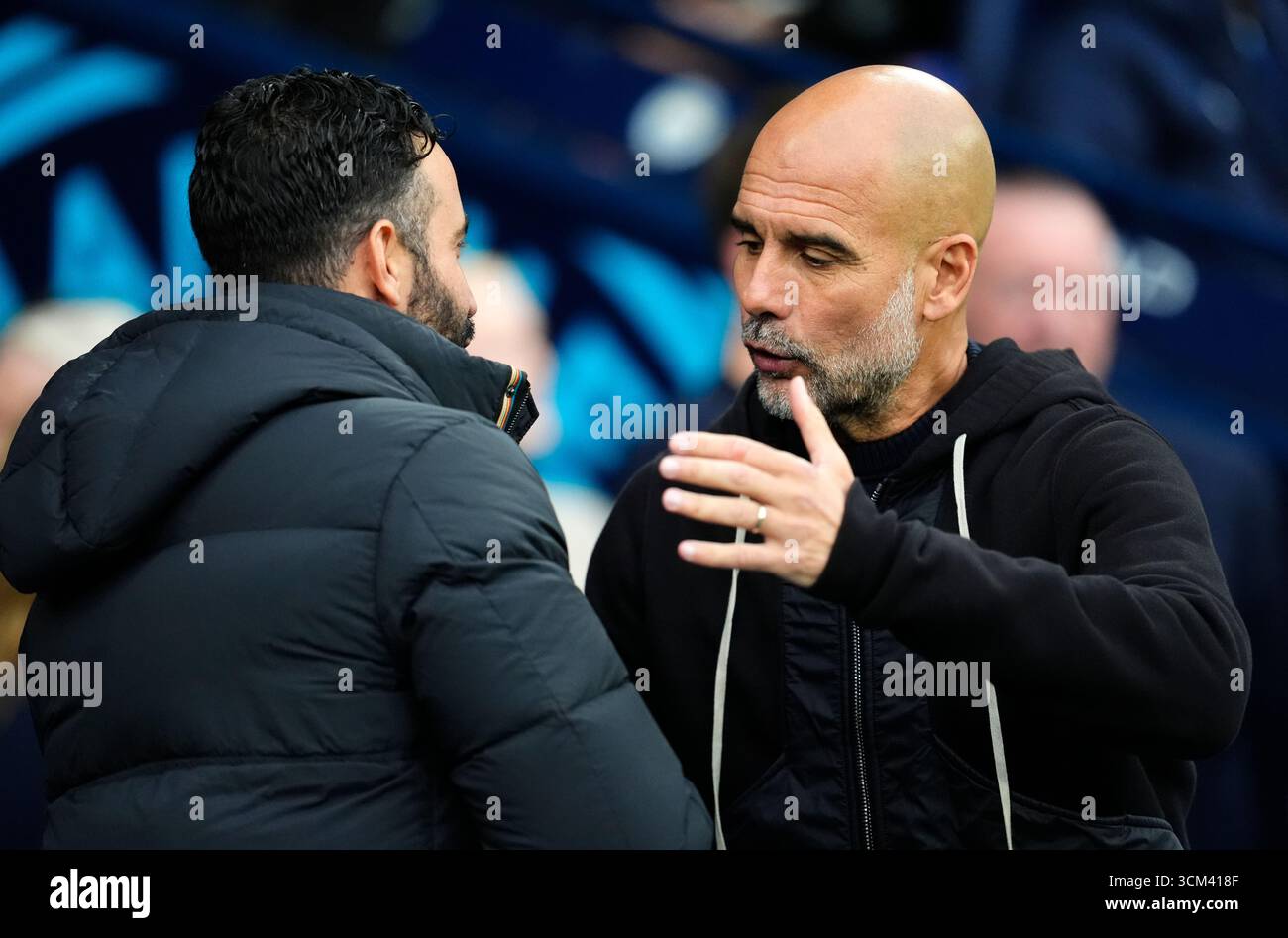 Manchester United manager Ruben Amorim greets Manchester City manager ...