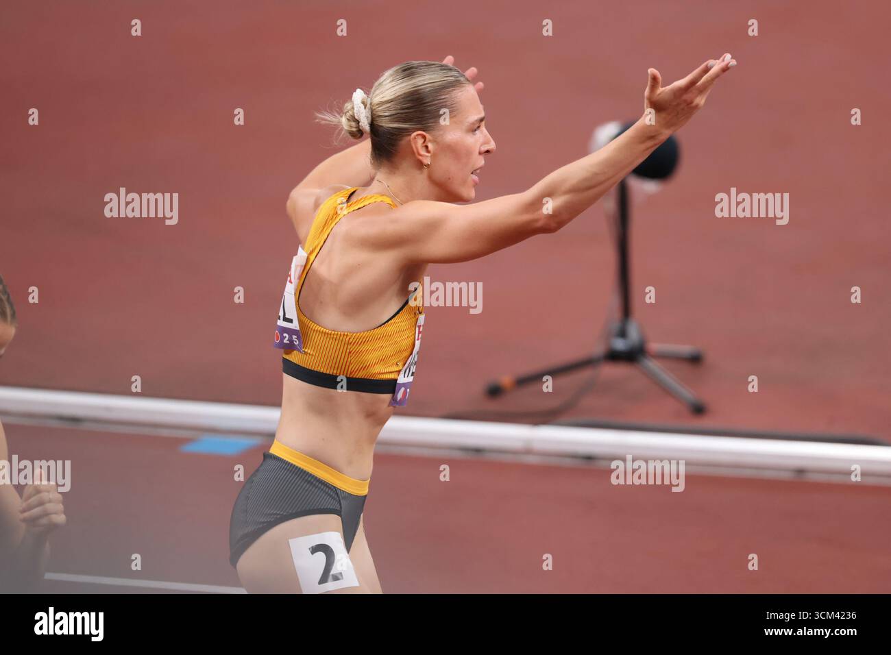 Nele Wessel (GER) goes down in her 1500m heat in front of Revee Walcott ...