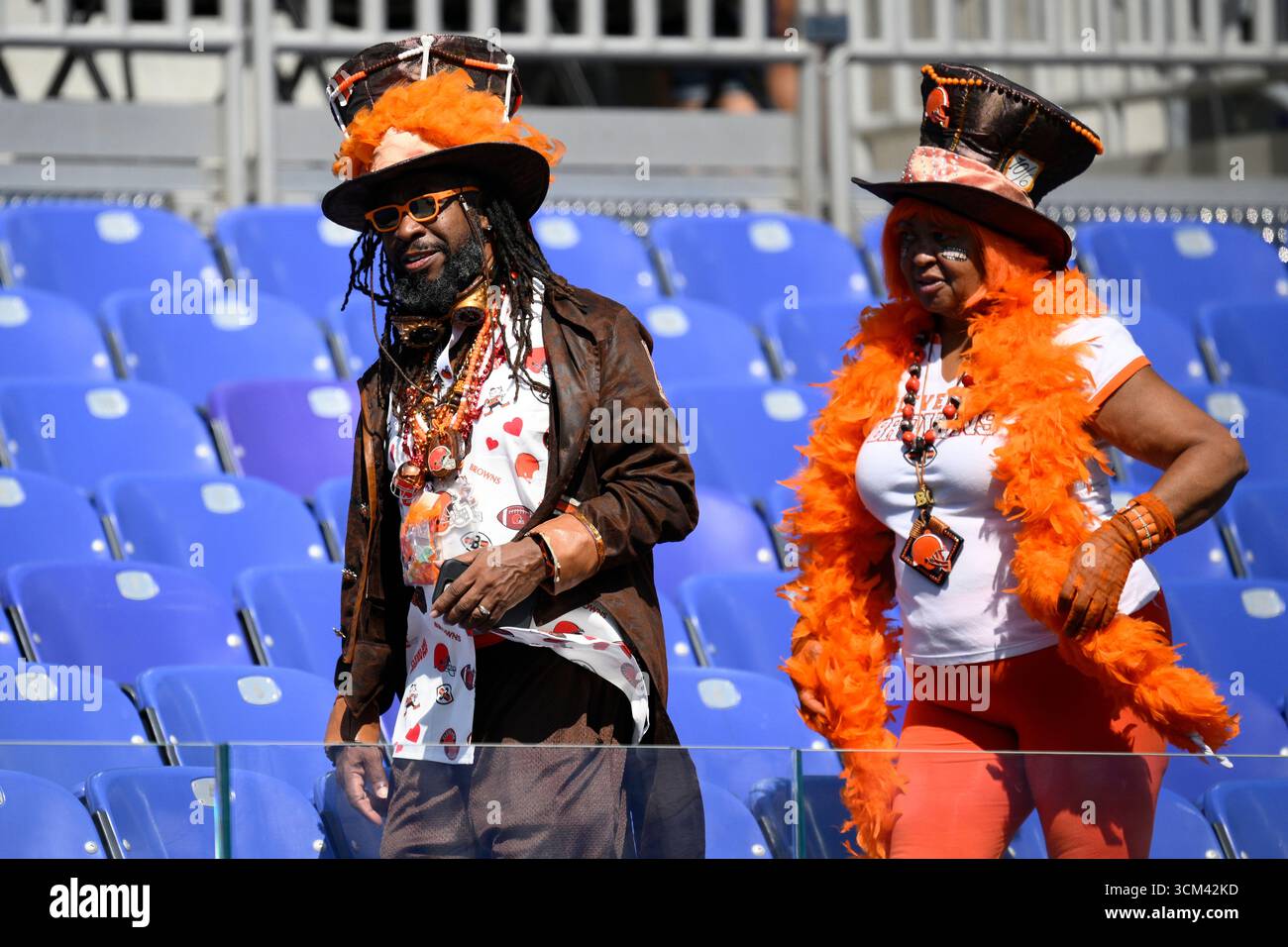 Fans arrive before an NFL football game between the Baltimore Ravens ...