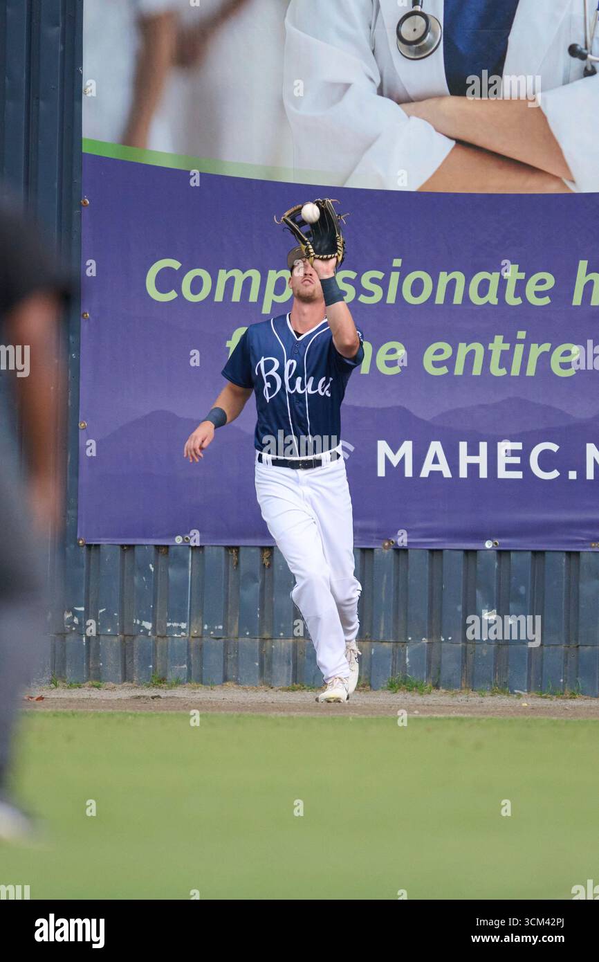 Asheville Blues right fielder Drew Brutcher (18) catches a fly ball ...