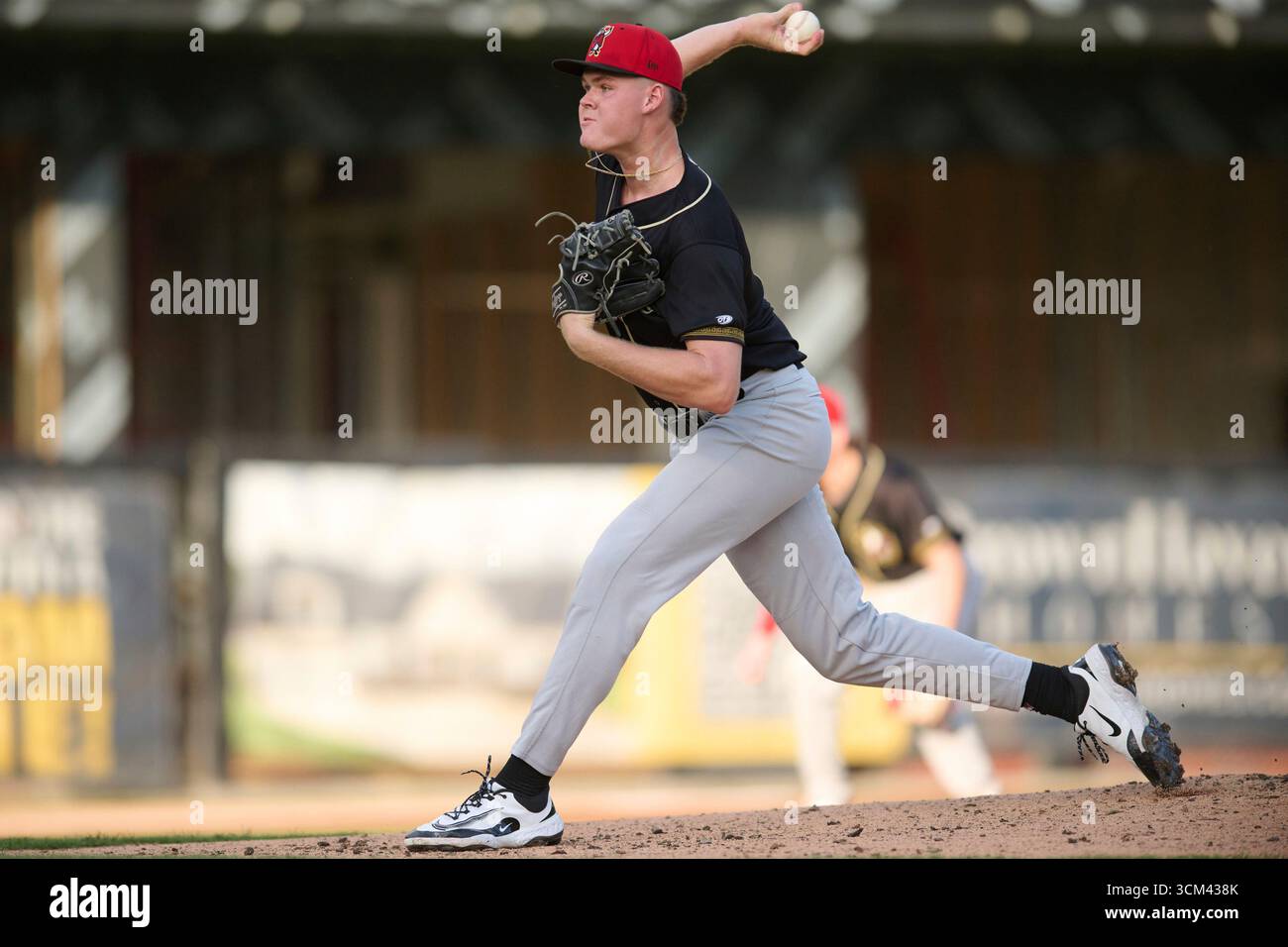 Rome Emperors starting pitcher Garrett Baumann (11) delivers a pitch ...