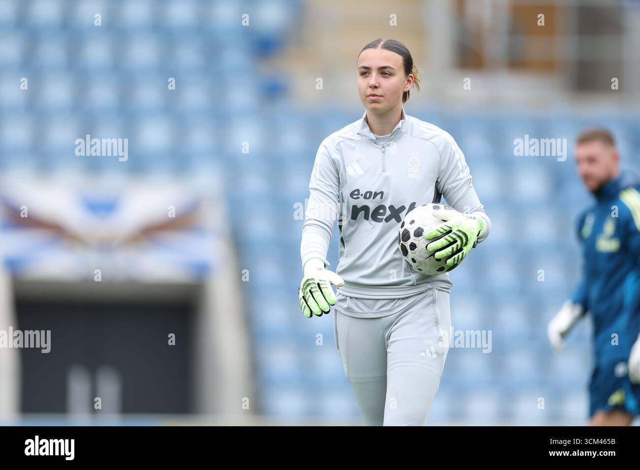 Sophia Poor, of Nottingham Forest Women, walking with a football before ...