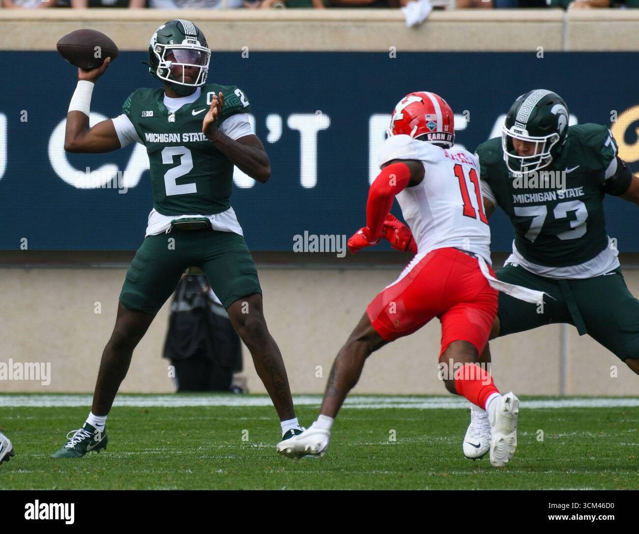 September 13, 2025: Michigan State quarterback Aidan Chiles (2) drops ...