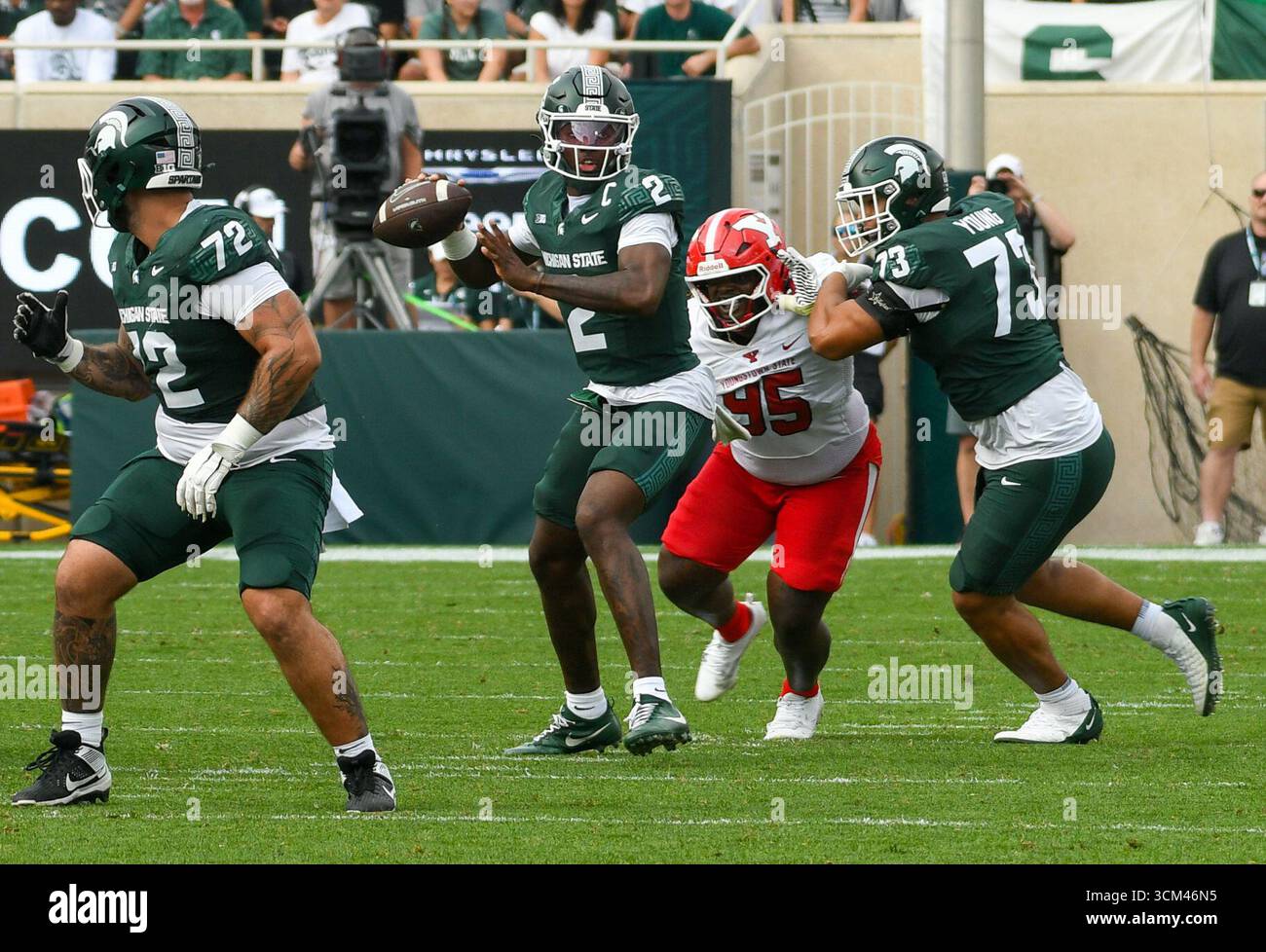September 13, 2025: Michigan State quarterback Aidan Chiles (2) drops ...