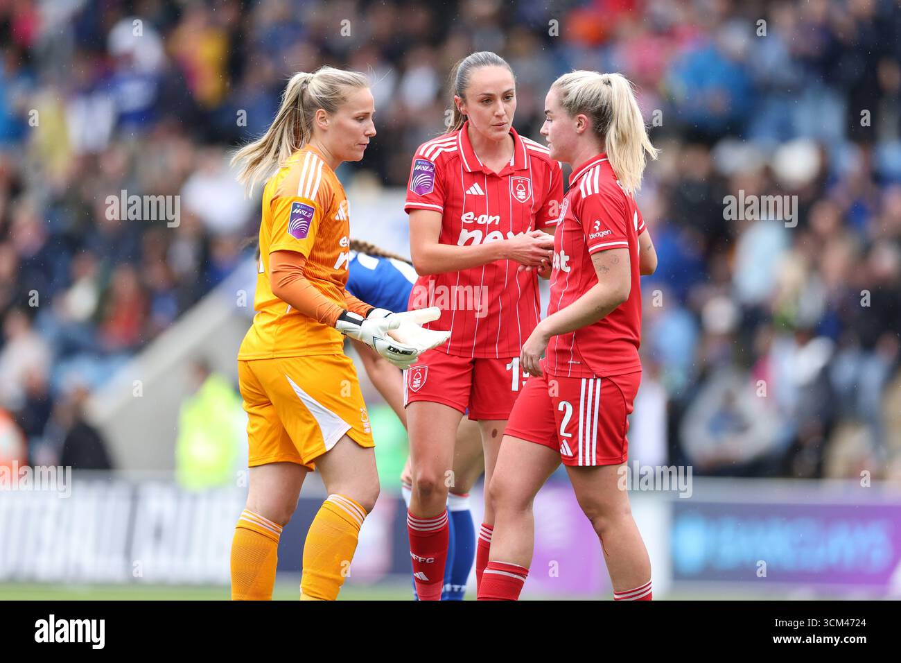 Nottingham Forest Women players hug each other after winning the match ...