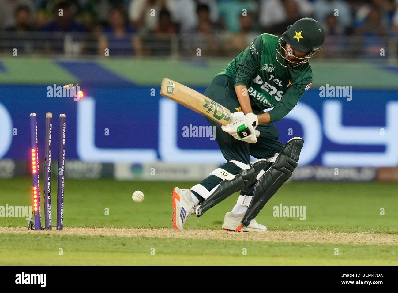 Pakistan's Sufiyan Muqeem is bowled out by India's Jasprit Bumrah ...