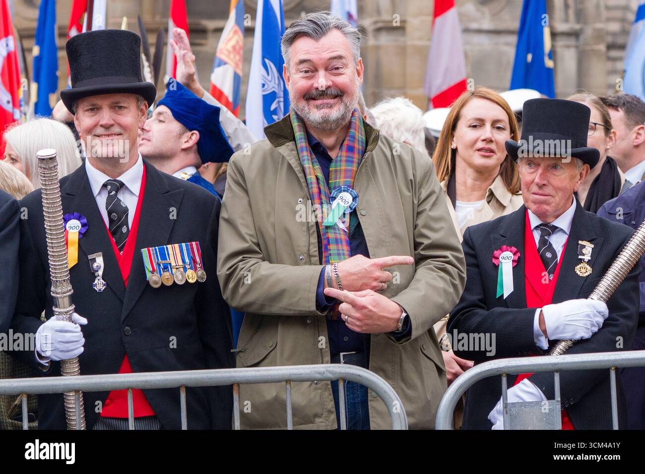 Grand Marshall Grant Stott watches as the Princess Royal, along with ...