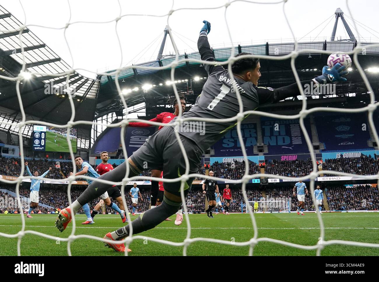Manchester City's Phil Foden scores their side's first goal of the game ...