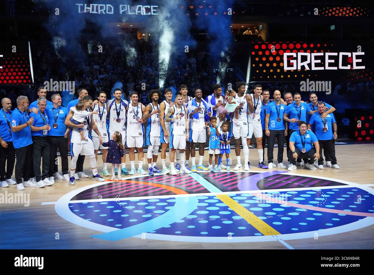 Greece players celebrate the bronze medal after the Eurobasket ...