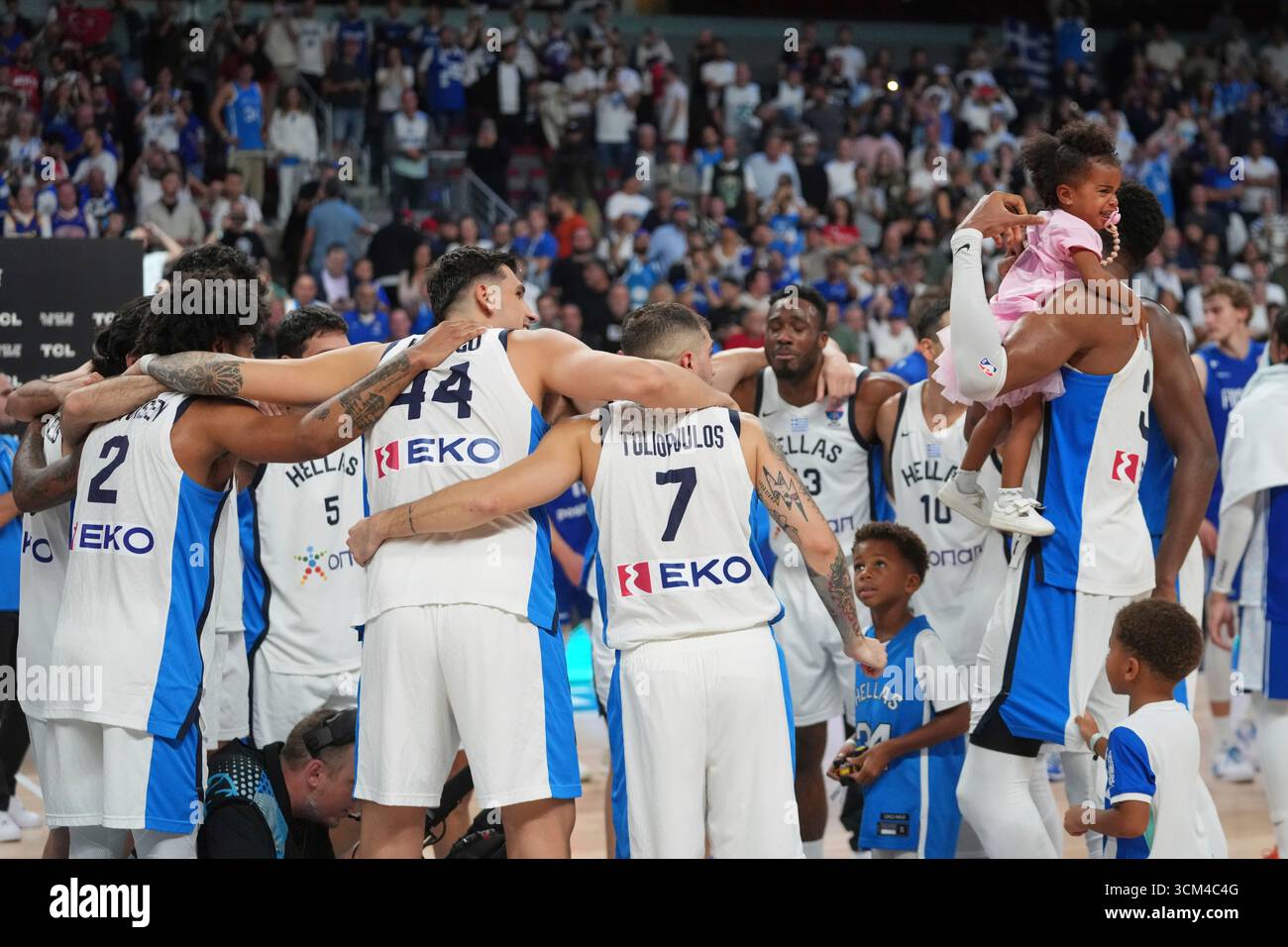 Greece players celebrate the bronze medals after the Eurobasket ...