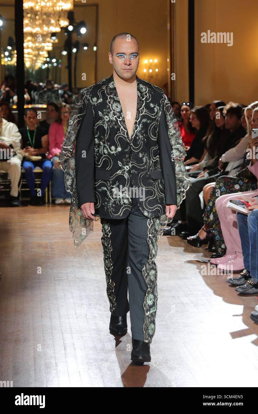 NEW YORK, NEW YORK – SEPTEMBER 13: Models walk the runway during the ...