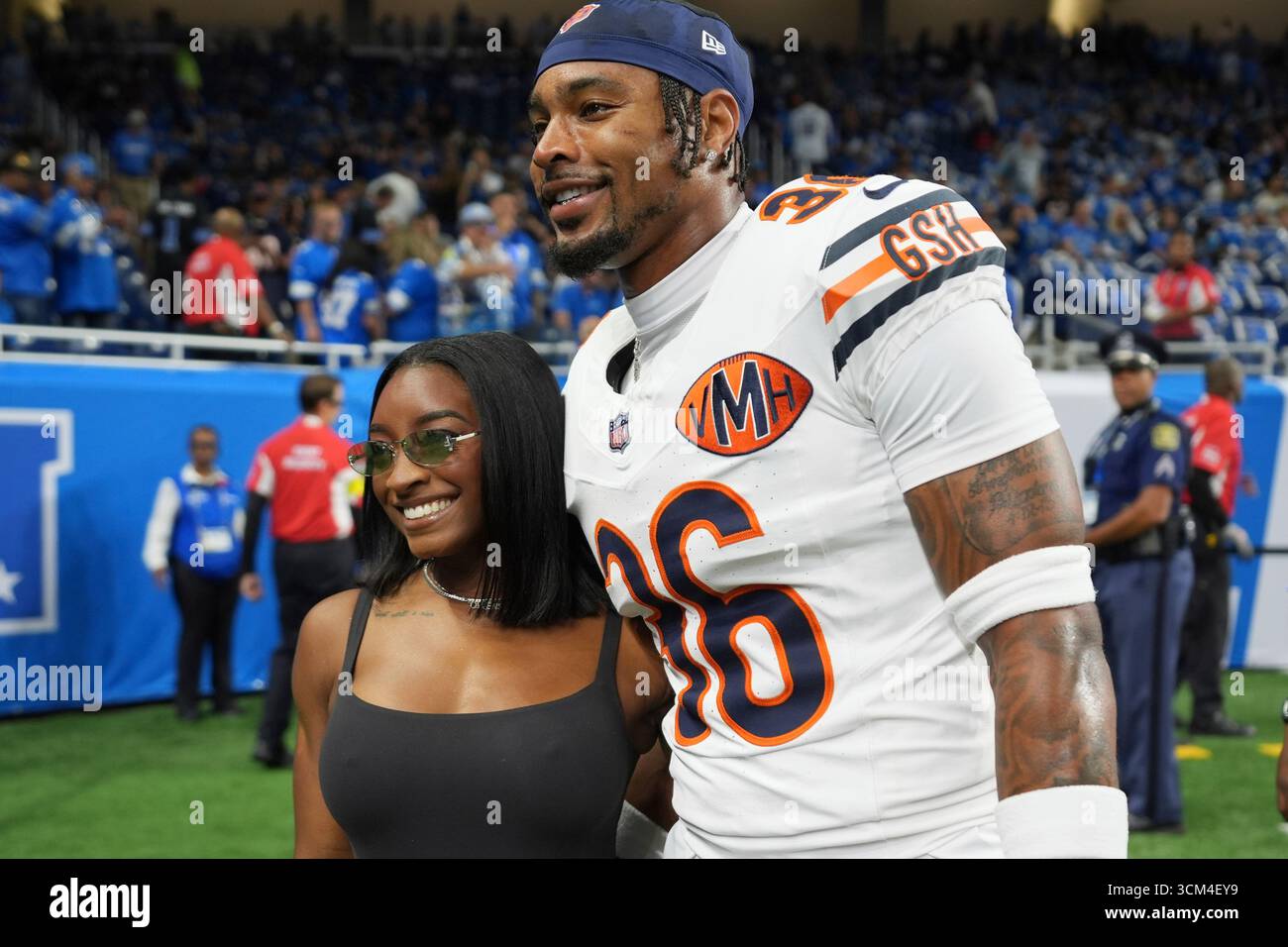 Chicago Bears safety Jonathan Owens (36) stands with his wive Simone Biles before an NFL ...