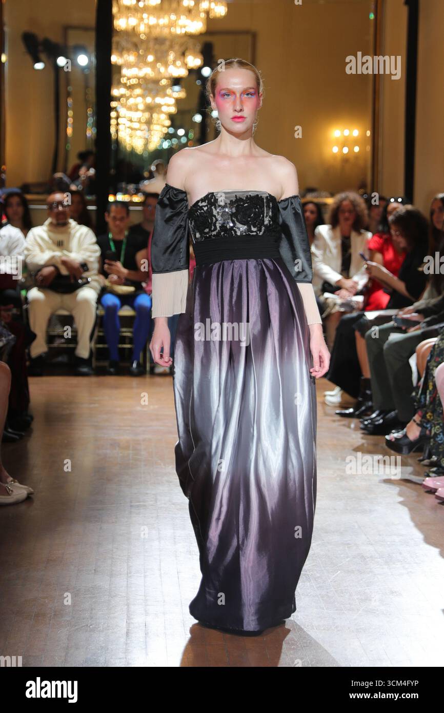 NEW YORK, NEW YORK – SEPTEMBER 13: Models walk the runway during the ...