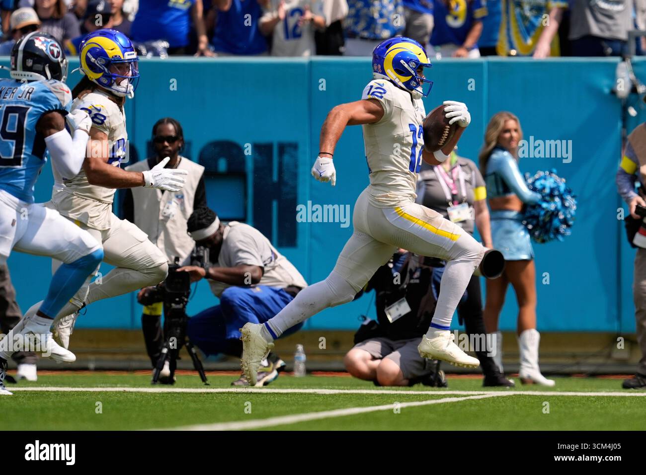 Los Angeles Rams wide receiver Puka Nacua runs for a touchdown during ...