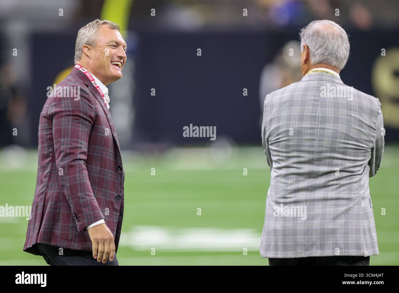 General managers John Lynch (San Francisco 49ers) chat with Mickey ...