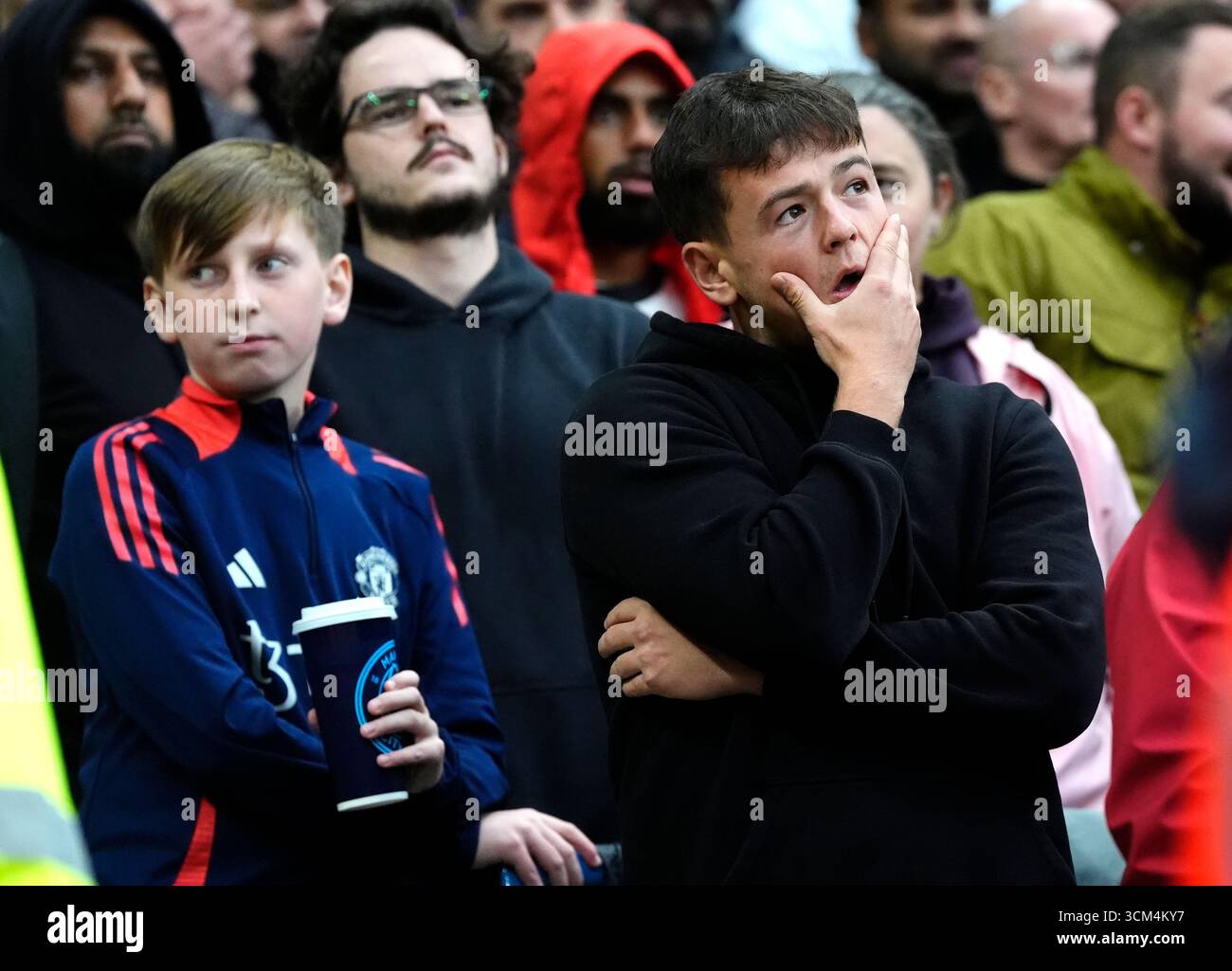 Manchester United fans react following the Premier League match at Etihad Stadium, Manchester ...