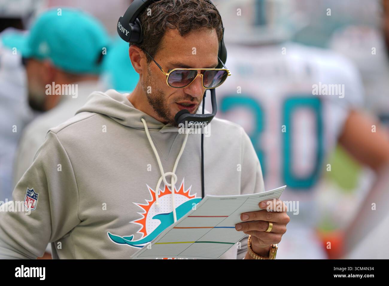 Miami Dolphins head coach Mike McDaniel looks for a play during the ...