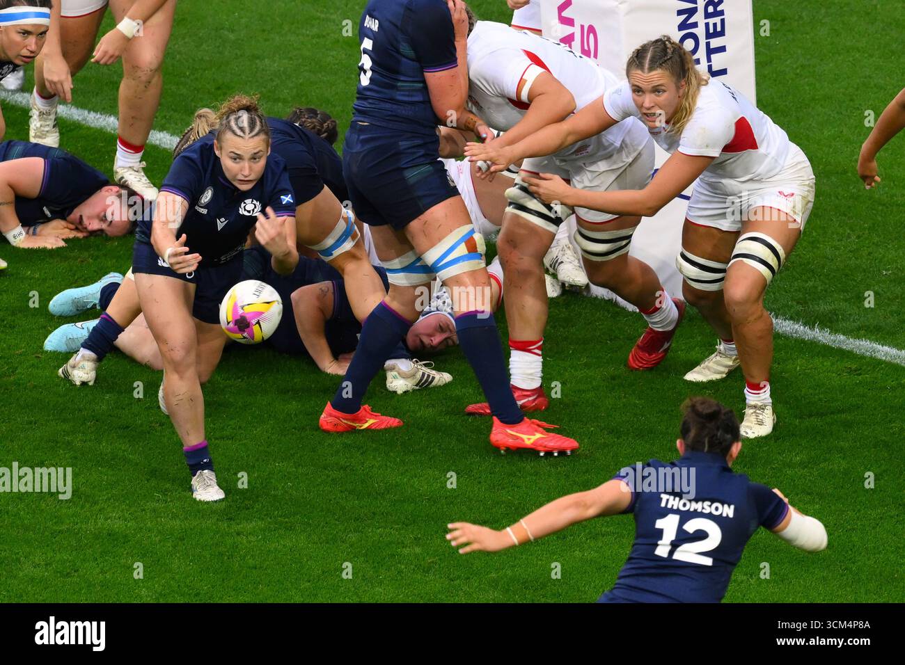 Leia Brebner-Holden of Scotland, left, passes the ball during the Women ...