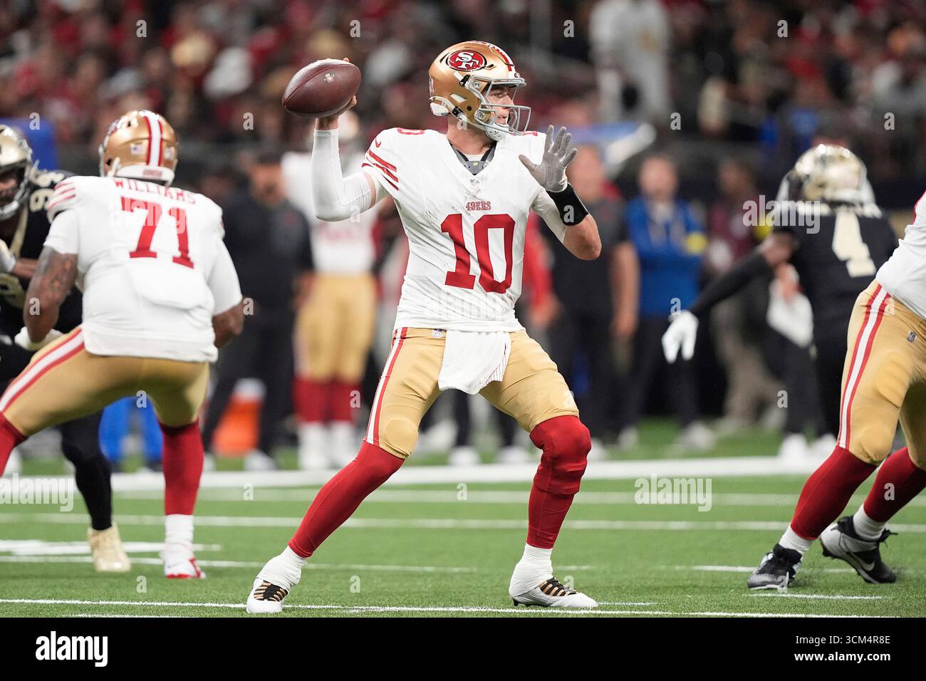 San Francisco 49ers quarterback Mac Jones (10) passes against the New ...