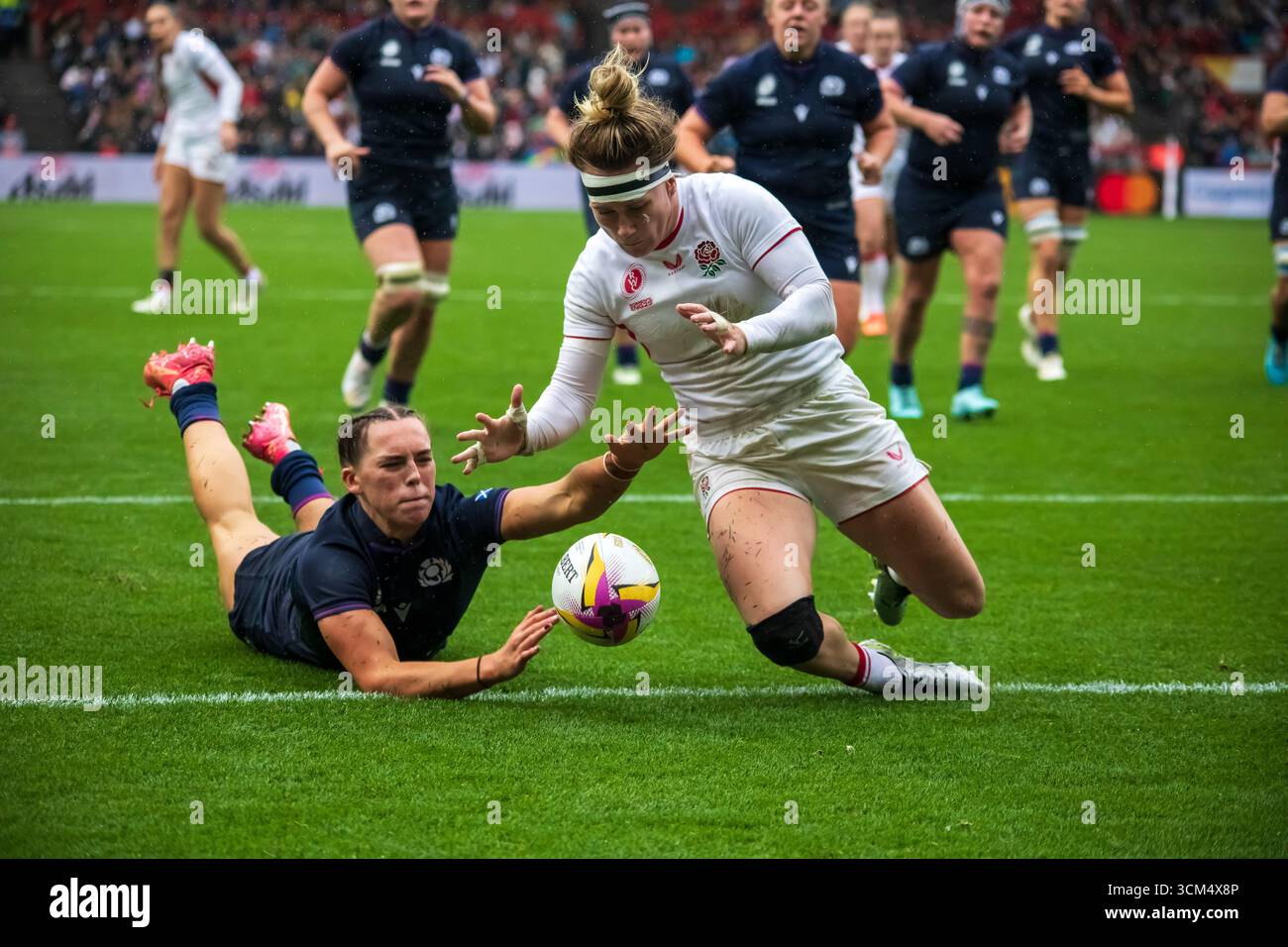 Bristol, UK, 14th September 2025 England centre Meg Jones (right) can't ...
