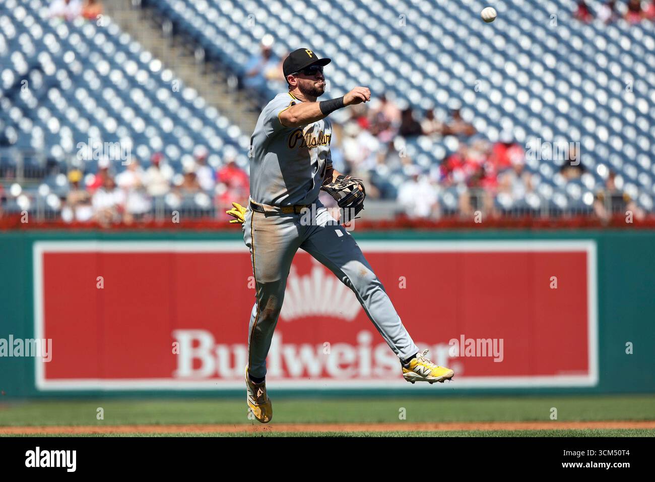 Pittsburgh Pirates shortstop Jared Triolo throws to first base for an ...