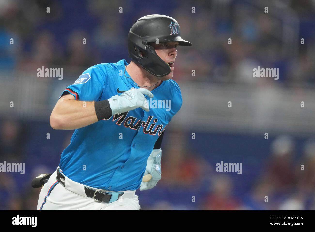 Miami Marlins' Troy Johnston hits a single to center field during the ...
