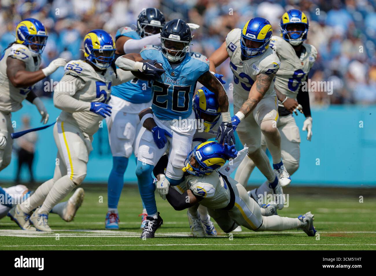 Tennessee Titans running back Tony Pollard (20) runs with the ball as ...
