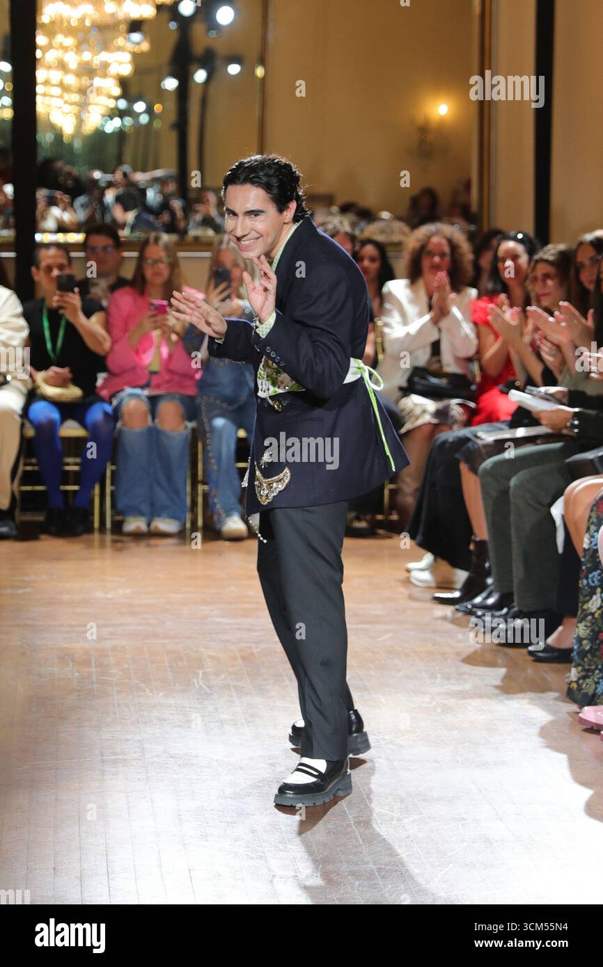 NEW YORK, NEW YORK SEPTEMBER 13: Models walk the runway during the Evan ...