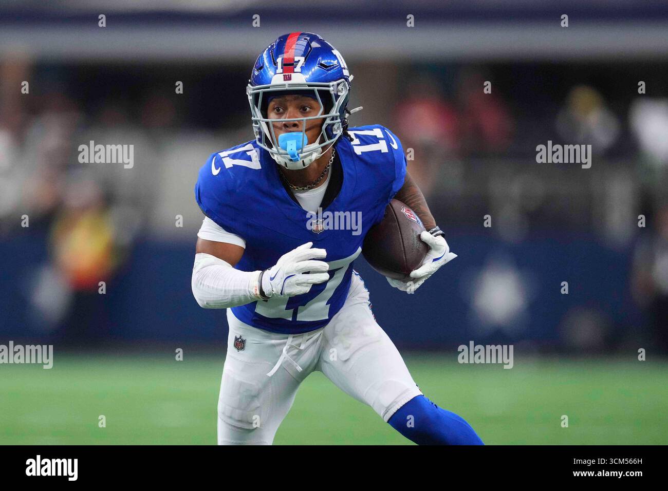 New York Giants wide receiver Wan'Dale Robinson gains yards after ...